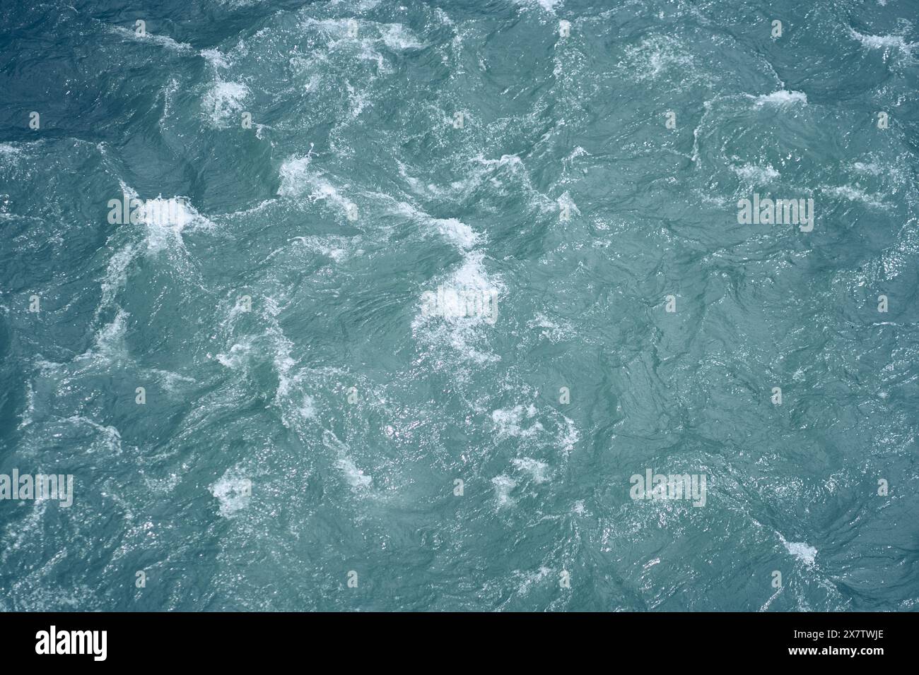 Ripples and waves on the water. Beautiful background with blue water ...