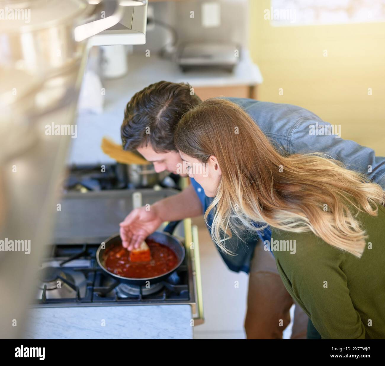 Stove, soup and couple in kitchen, cooking and meal prep for date, man ...