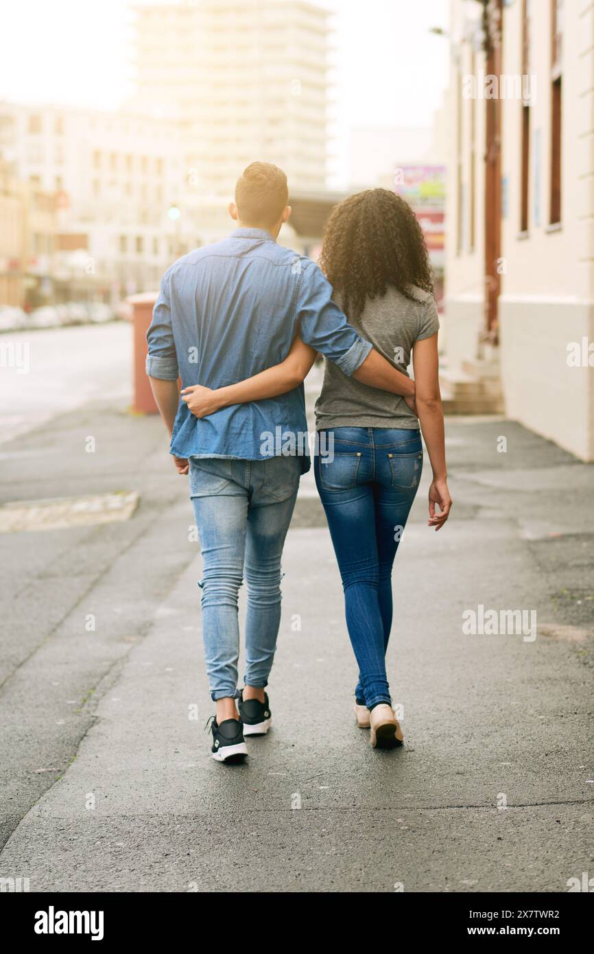 Walking, hugging and back of couple on street in city for outdoor ...