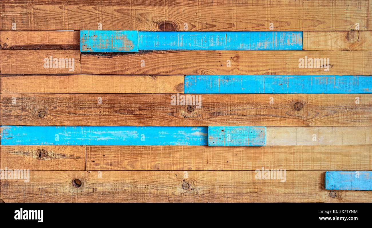 A wooden panel made with rustic wooden slats, unpainted wood, and some ...