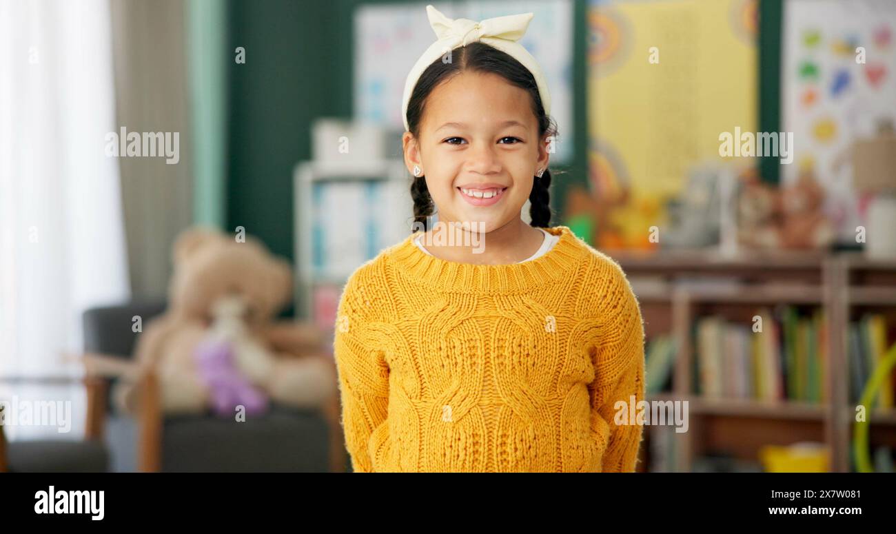 Smile, face and girl in classroom for education, learning and ready for ...