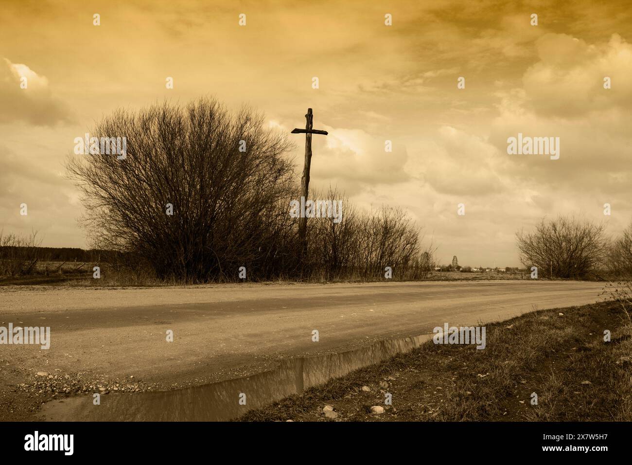 An old wooden cross on a rural sandy road Stock Photo - Alamy