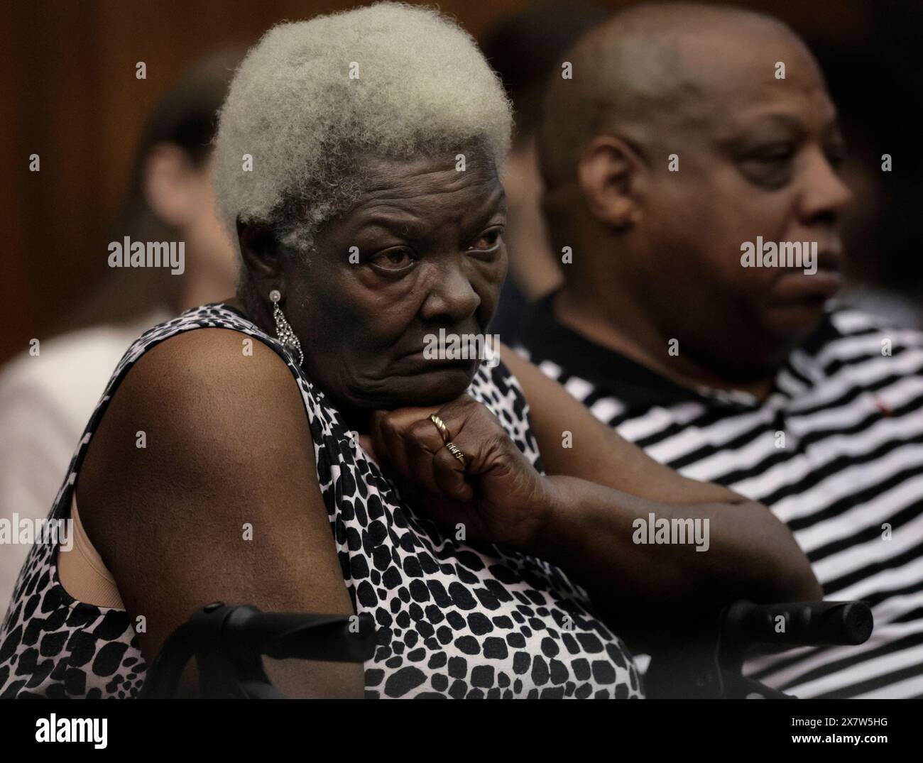 Martha Dunn, the mother of Christopher Dunn, listens to testimony ...
