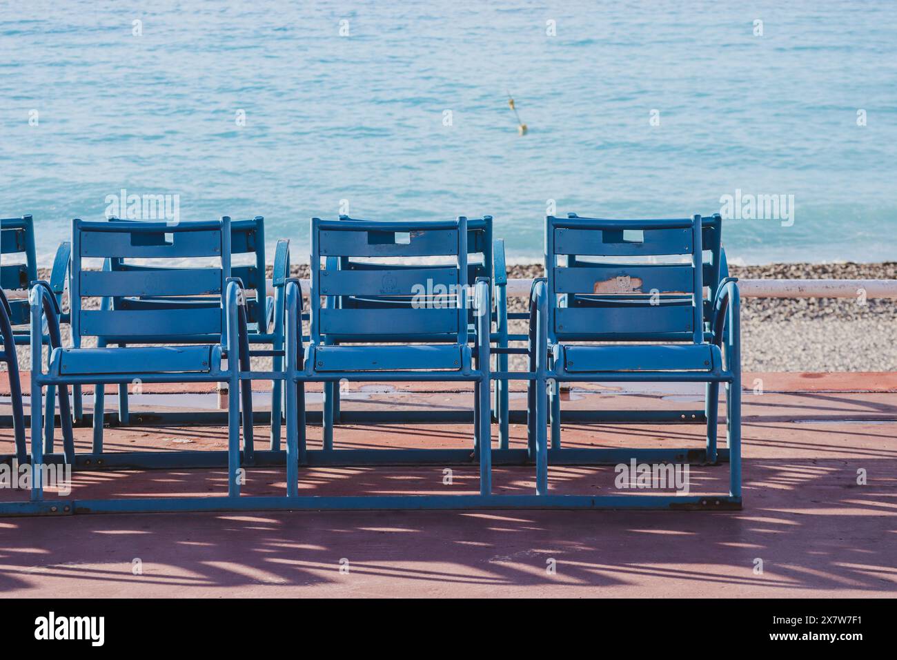 Famous blue chairs on the Promenade des Anglais in Nice Stock Photo - Alamy