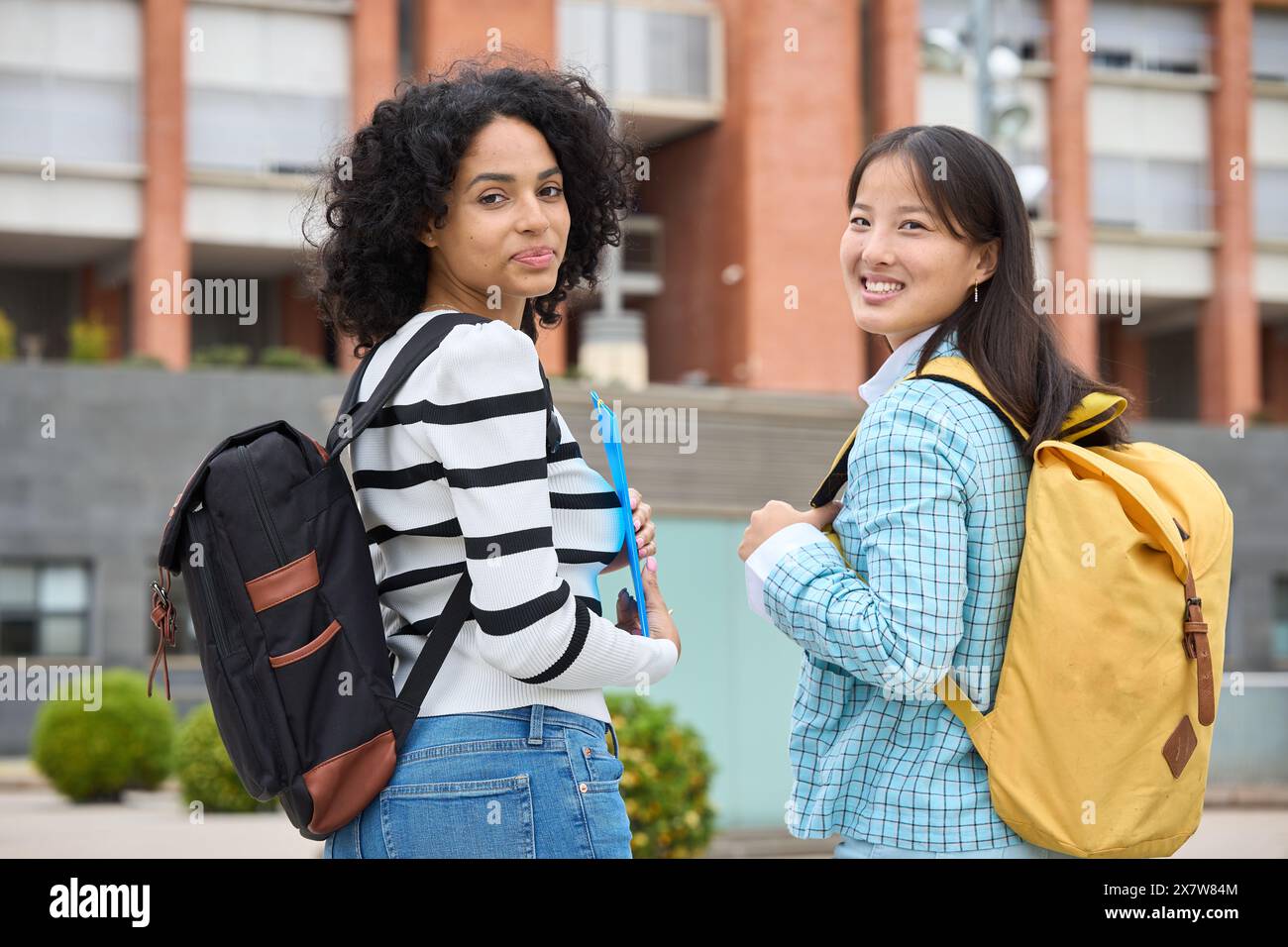 Female teen students backpacks hi-res stock photography and images - Alamy