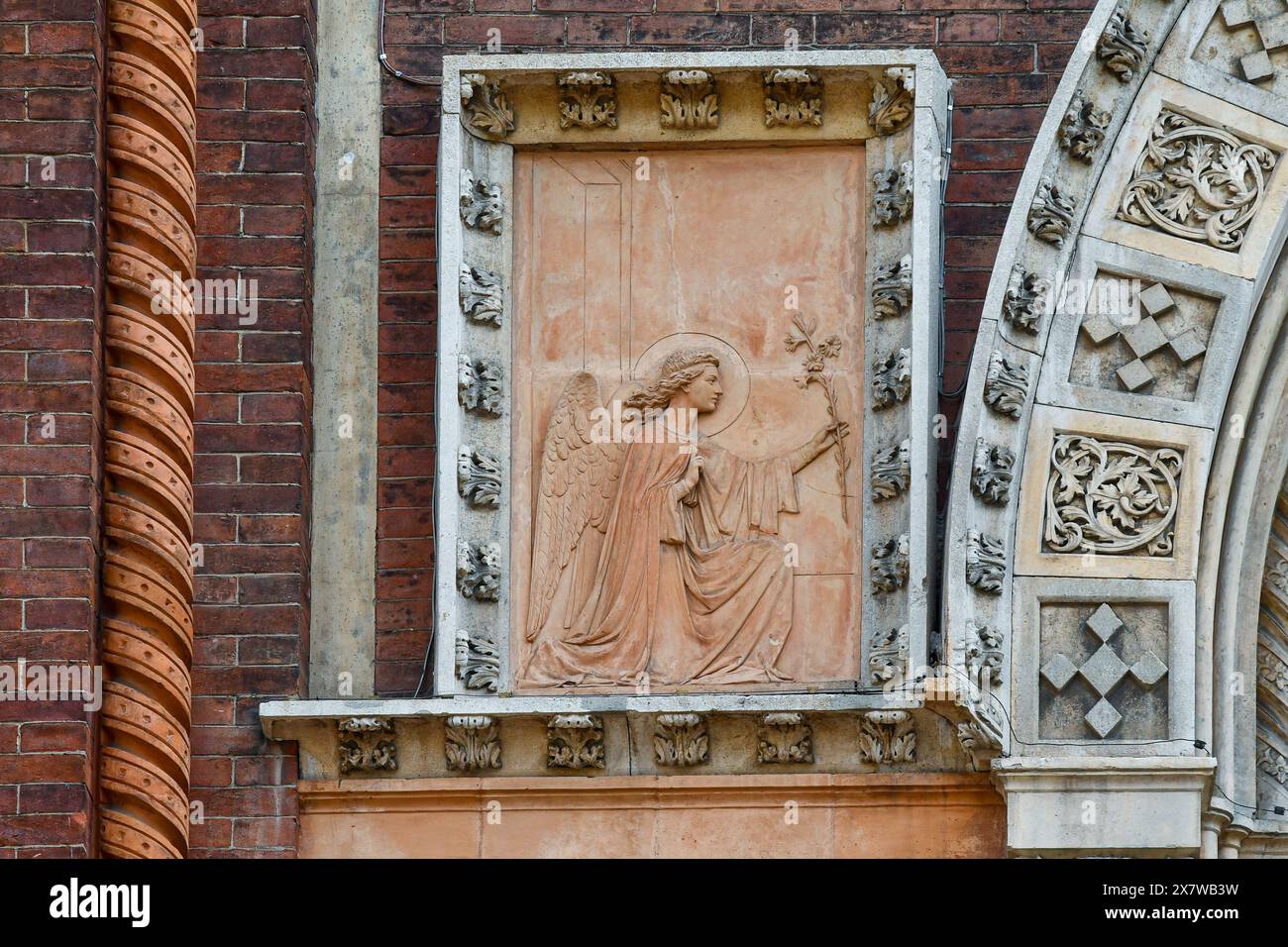 Terra cotta bas-relief (1880) depicting the Archangel Gabriel next to ...