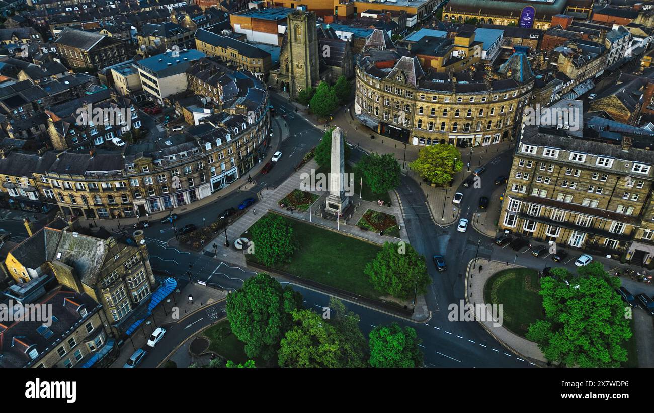 Aerial view of a town square with a central obelisk monument surrounded ...