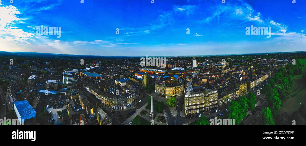 Aerial panoramic view of a city with a mix of historic and modern ...