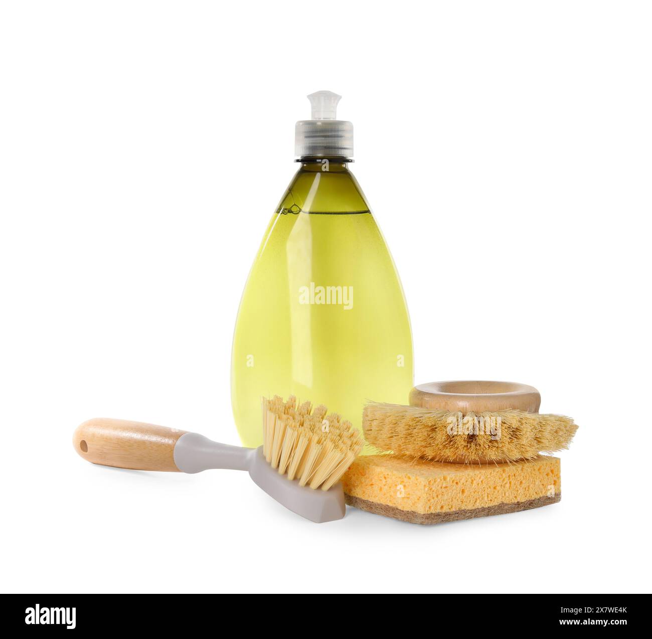 Bottle of cleaning product, brushes and sponge isolated on white Stock ...