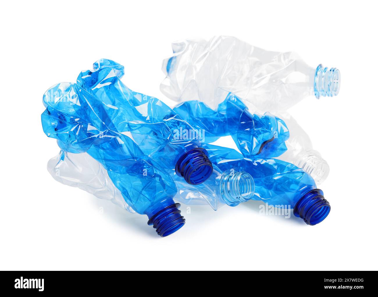 Crumpled disposable plastic bottles on white background Stock Photo - Alamy