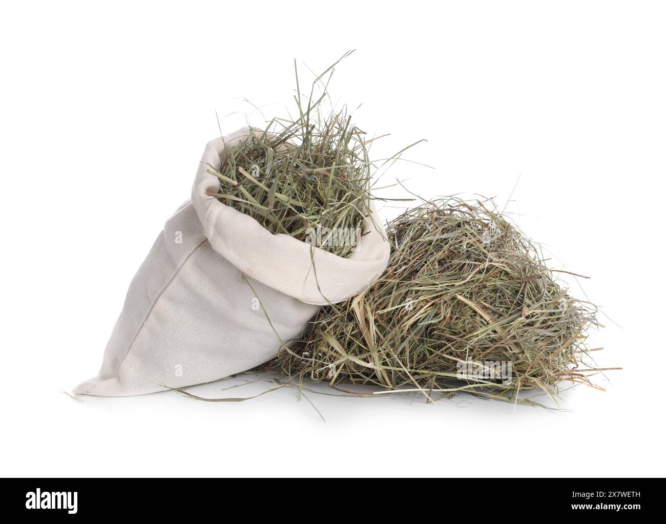 Dried hay in burlap sack isolated on white Stock Photo - Alamy