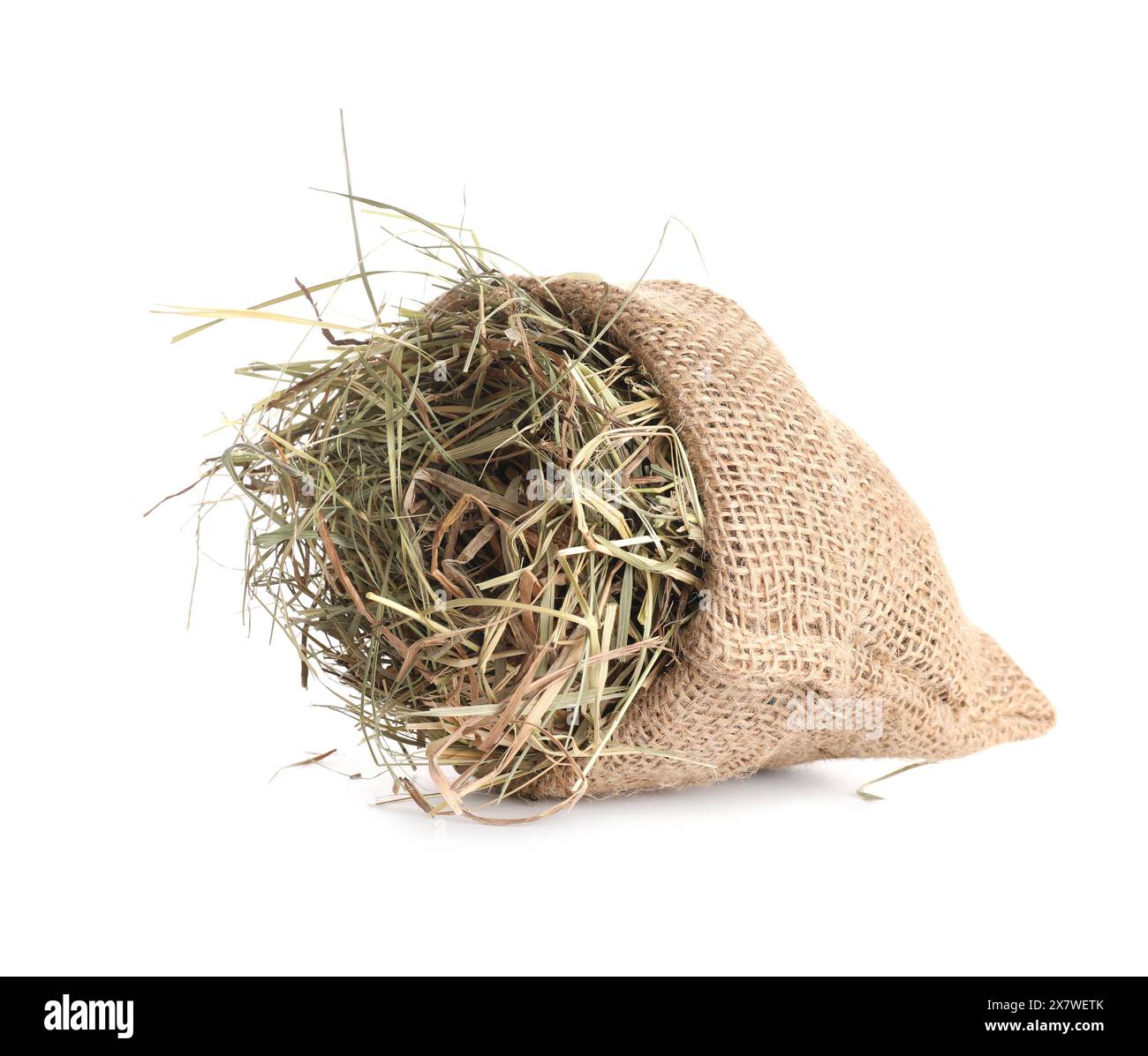 Dried hay in burlap sack isolated on white Stock Photo - Alamy