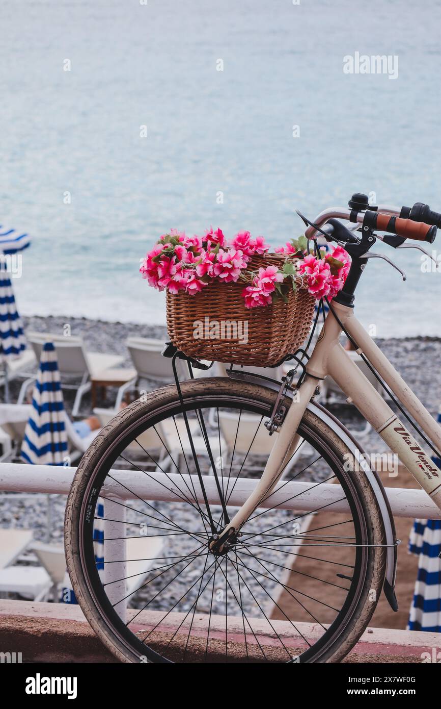 Nice, France - 29.09.2022 : Bicycle with a flower basket near the beach ...