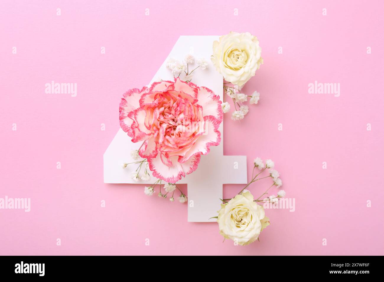 Paper number 4 and beautiful flowers on pink background, flat lay Stock ...