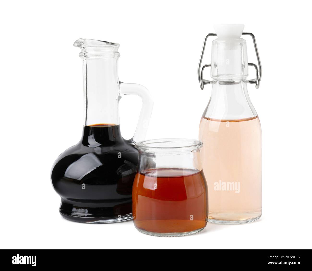 Different types of vinegar isolated on white Stock Photo - Alamy