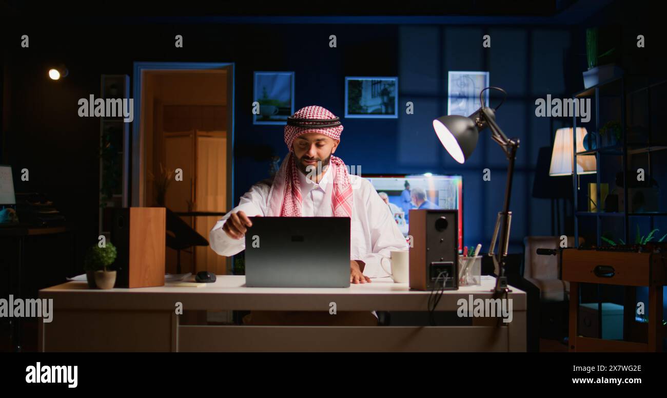 Arab employee arriving in stylish apartment personal office, starting ...