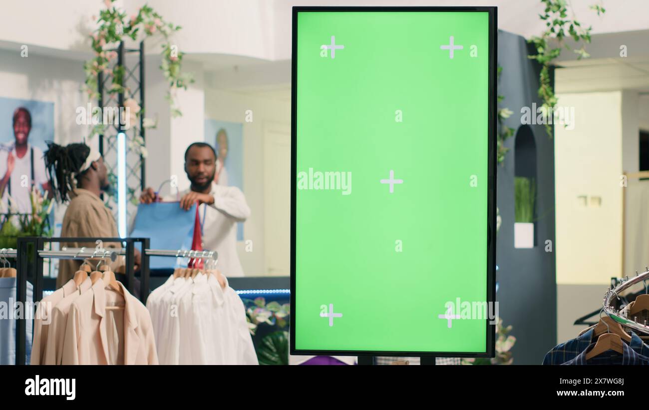 Second hand clothing shop green screen kiosk ready to be used by ...