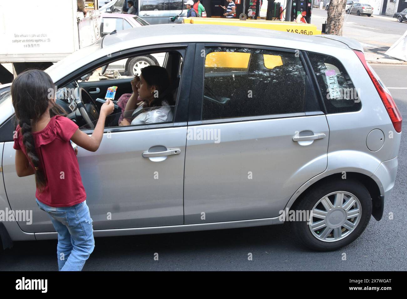 A Venezuelan migrant girl from an encampment in the Misterios ...
