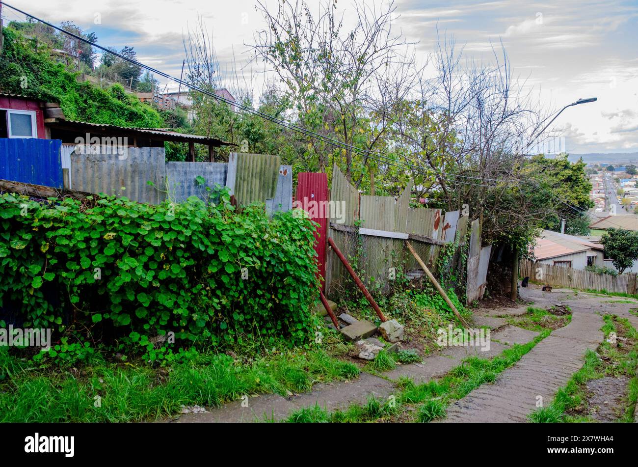 Old houses at cerro La Gloria in Talcahuano, affected by soil creep ...