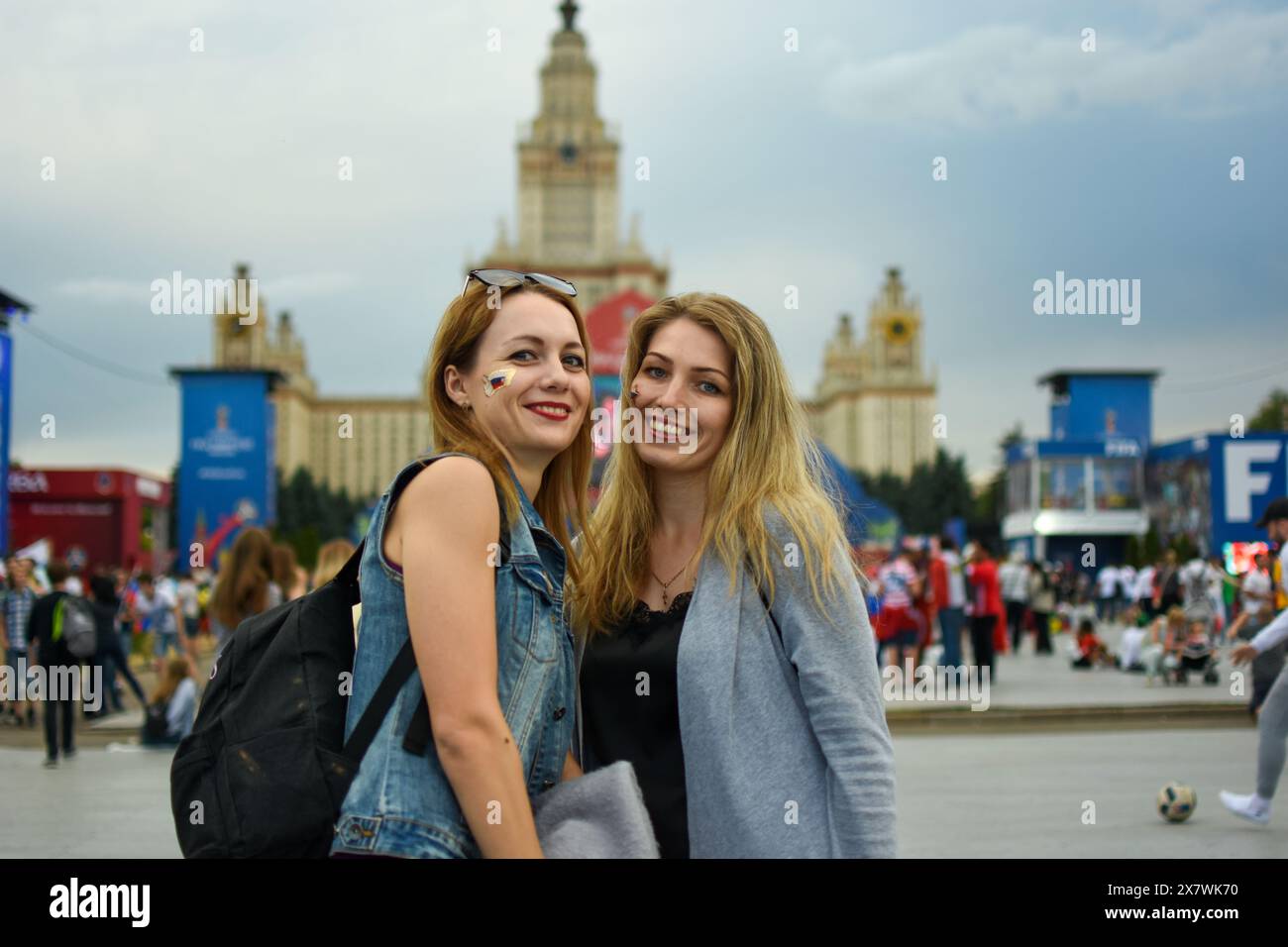 Russian girls with face painted with flag celebrating at the FIFA Fan ...