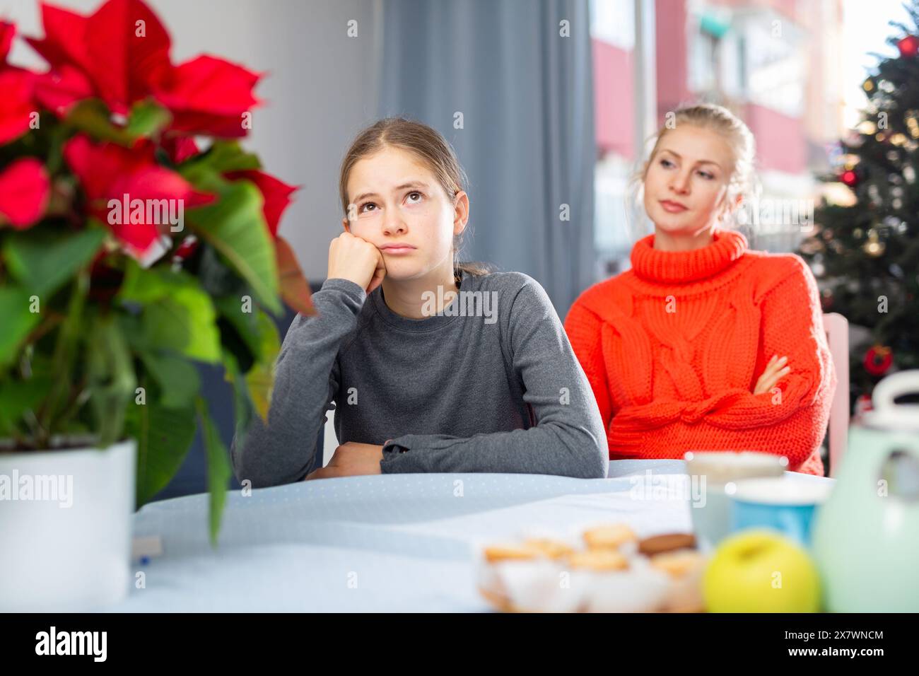 Quarrel between mom and daughter during christmas Stock Photo - Alamy