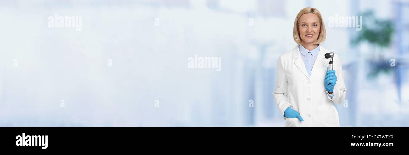 Professional dermatologist with dermatoscope on blurred background ...