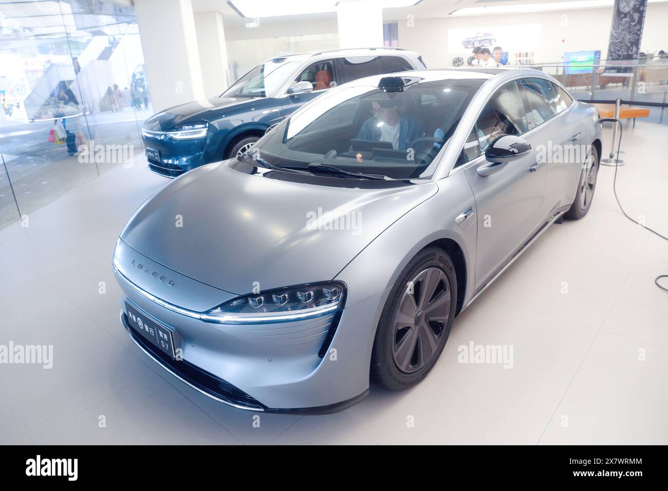 SHANGHAI, CHINA - MAY 19, 2024 - A Harmony Intelligent Mobility Alliance (HIMA) electric vehicle ...