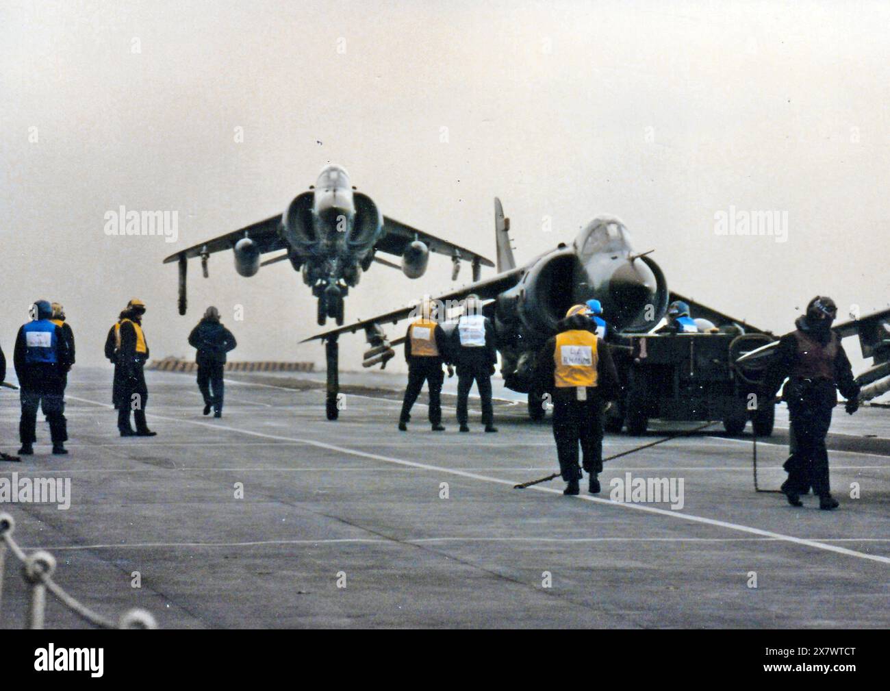 NAVAL HARRIER JUMP JETS LAND ON AIRCRAFT CARRIER HMS INVINCIBLE, 1990 ...