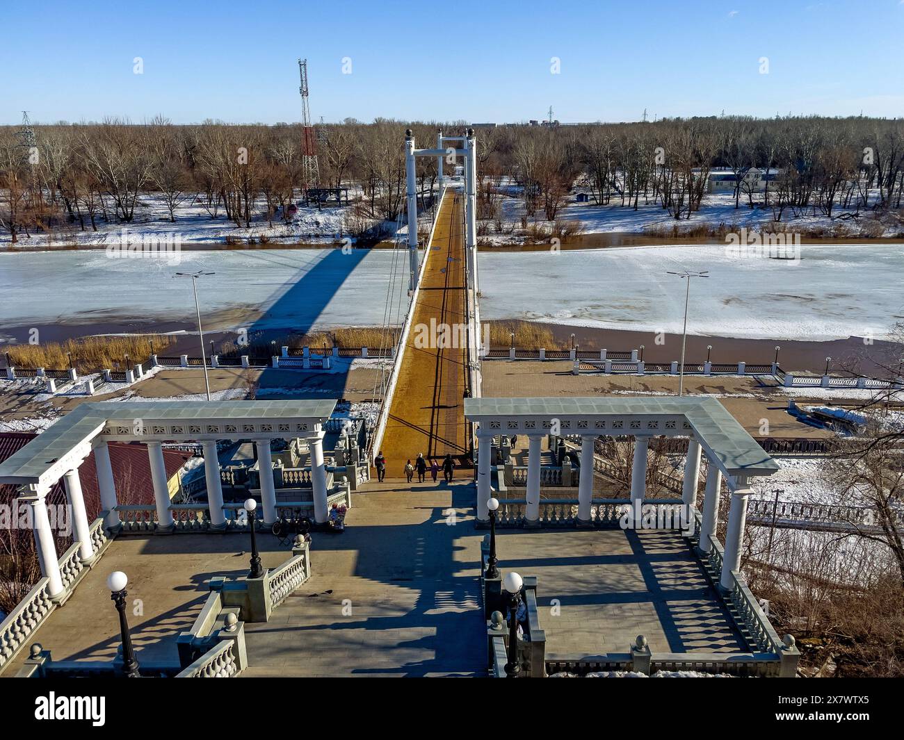 Orenburg, Russia- March 29, 2024 The pedestrians bridge over the Ural ...