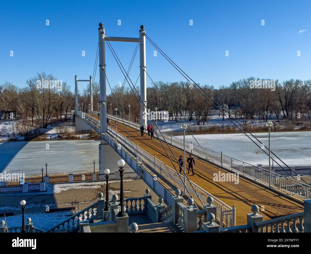 Orenburg, Russia- March 29, 2024 The pedestrians bridge over the Ural ...