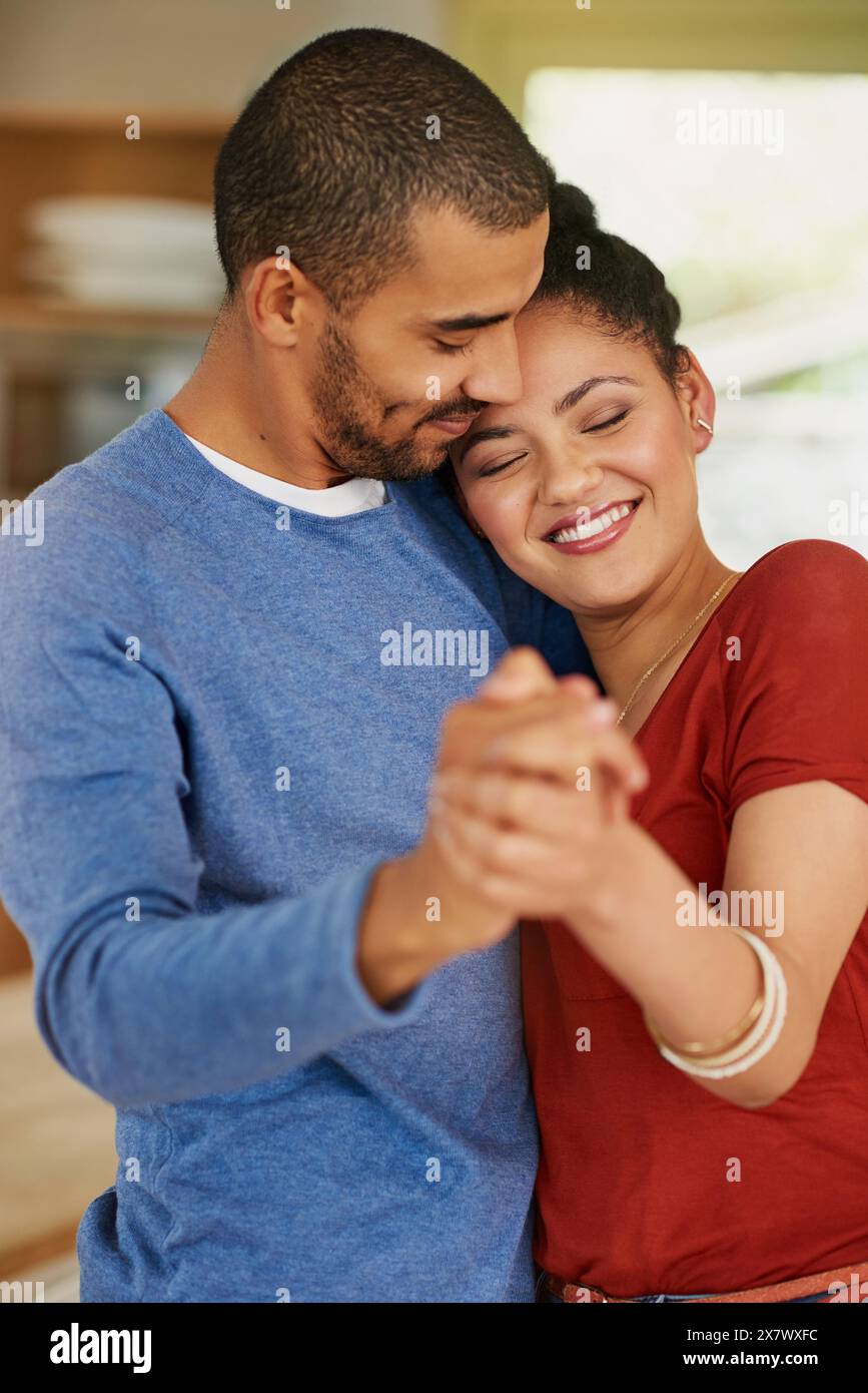 Happy, couple and dancing together in kitchen with love, care and ...