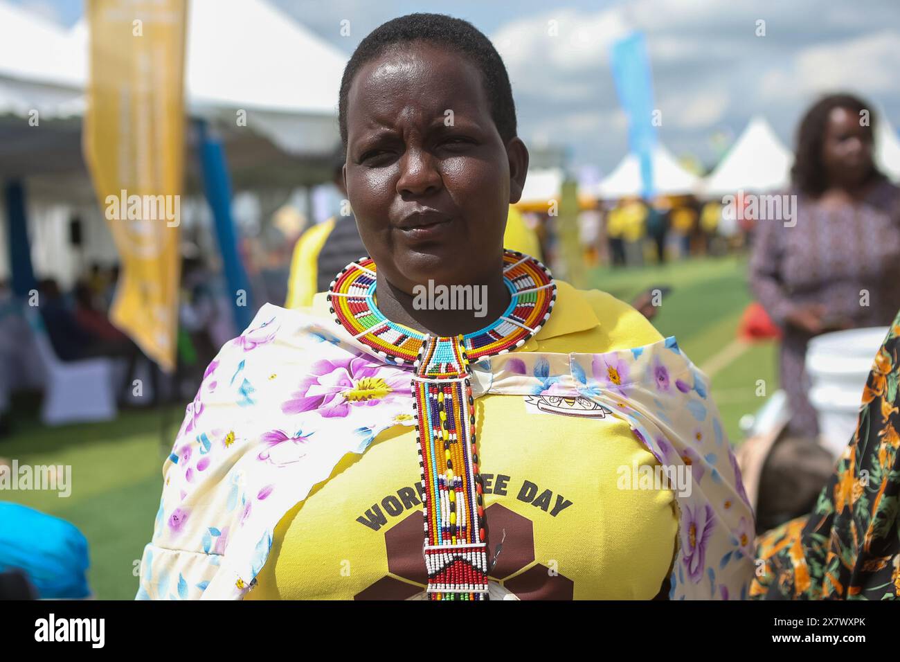 A local Bee farmer from Kisaju Kajiado county, poses for a photo during ...