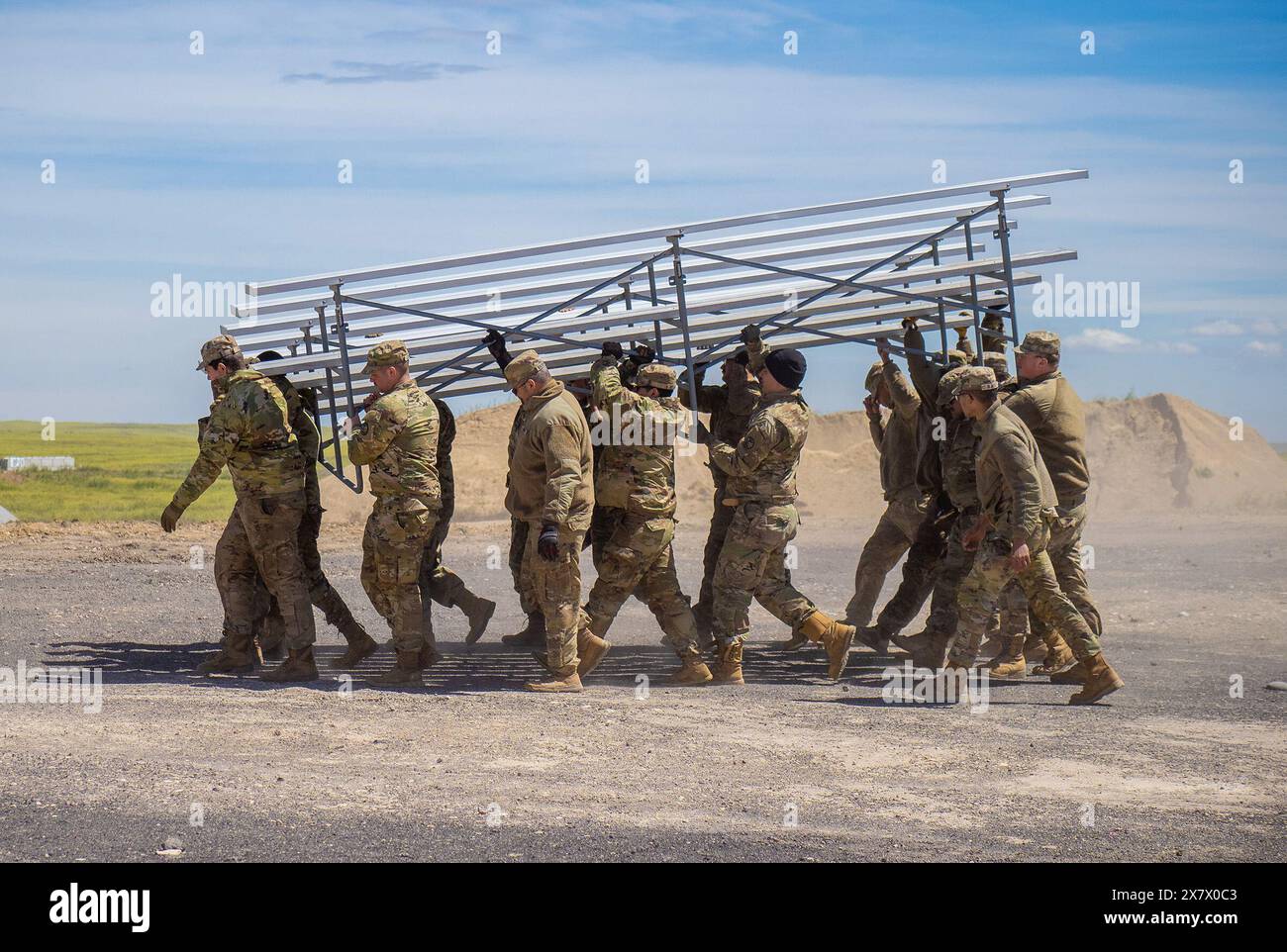 Soldiers from the 3rd Battalion, 116th Cavalry Regiment, carry a set of ...