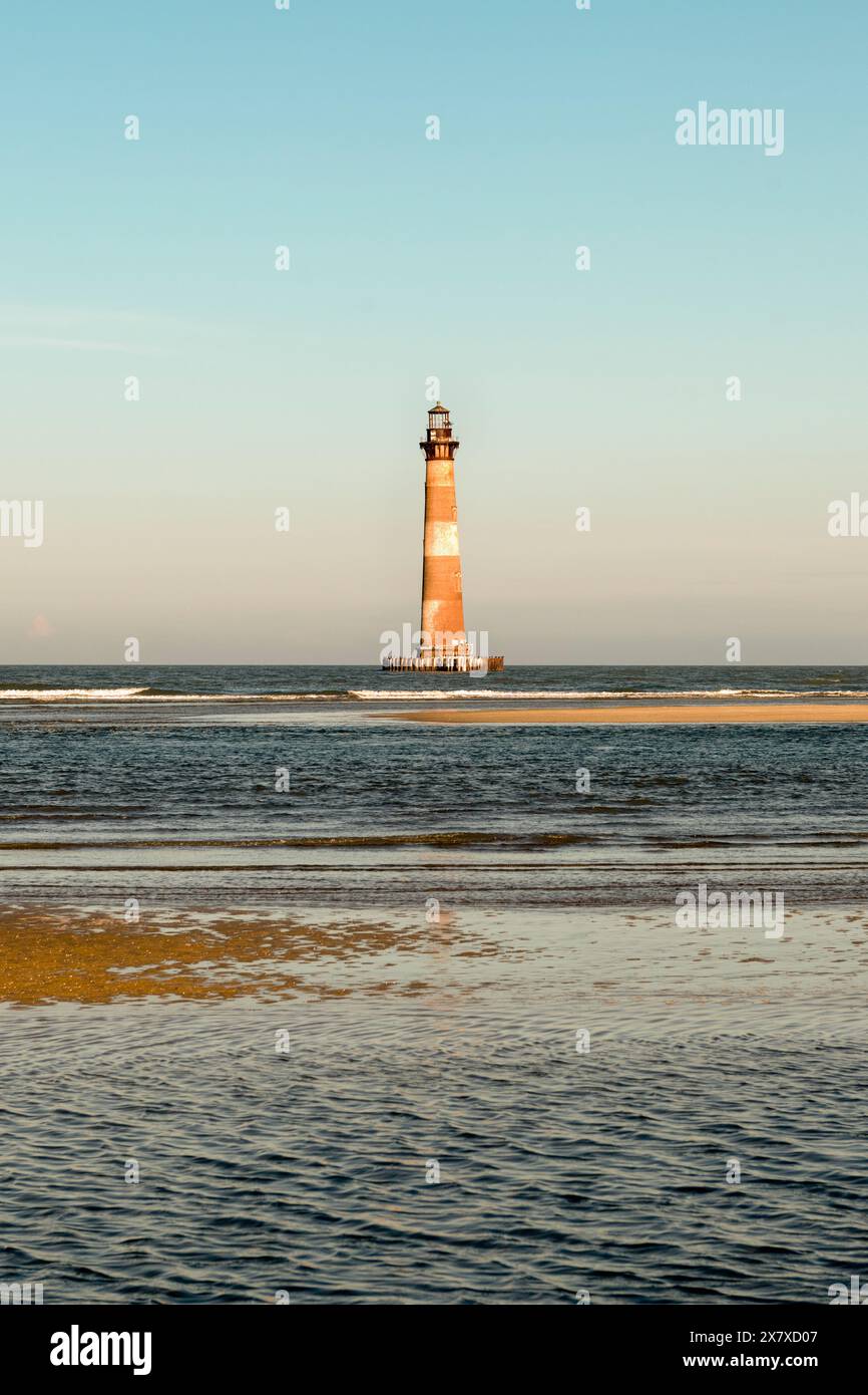 Morris Island Lighthouse from the shoreline of Folly Beach near ...