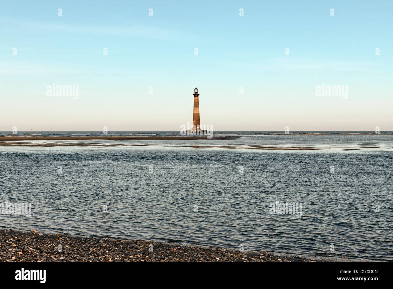 Morris Island Lighthouse from the shoreline of Folly Beach near ...