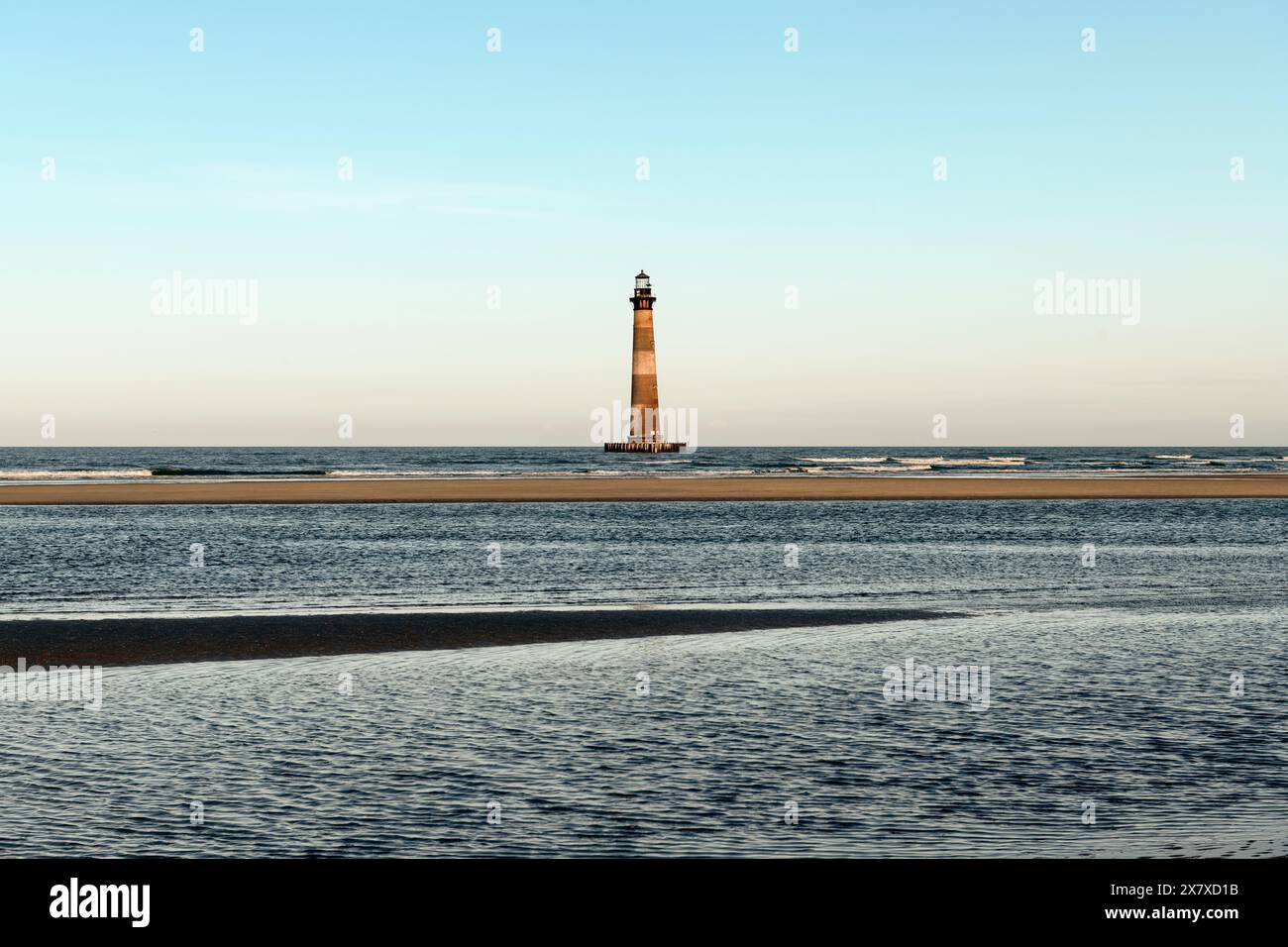 Morris Island Lighthouse from the shoreline of Folly Beach near ...