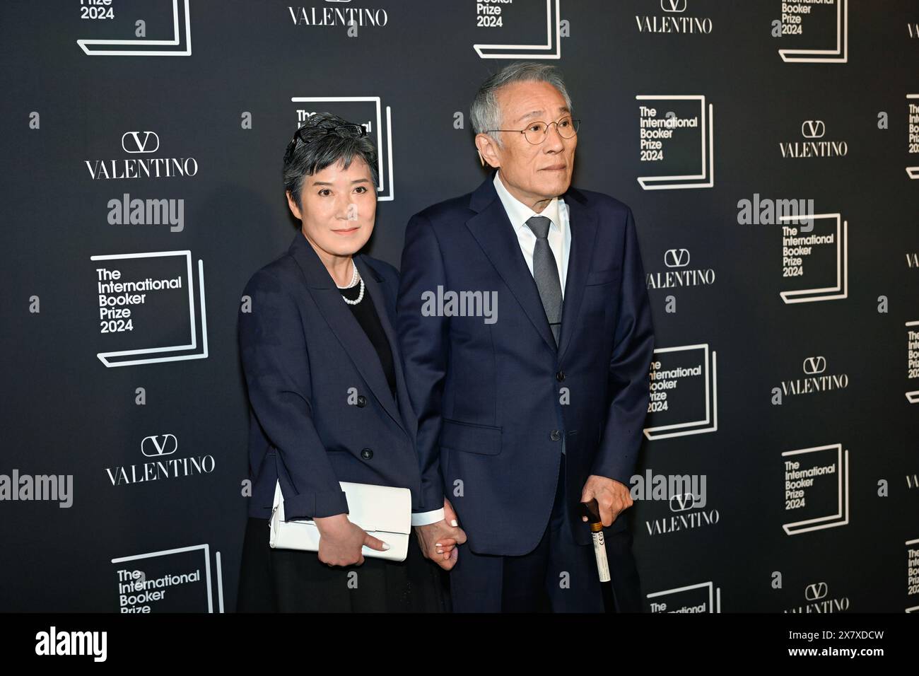 LONDON, ENGLAND - MAY 21 2024: Author Hwang Sok-yong (R) and guest with ...