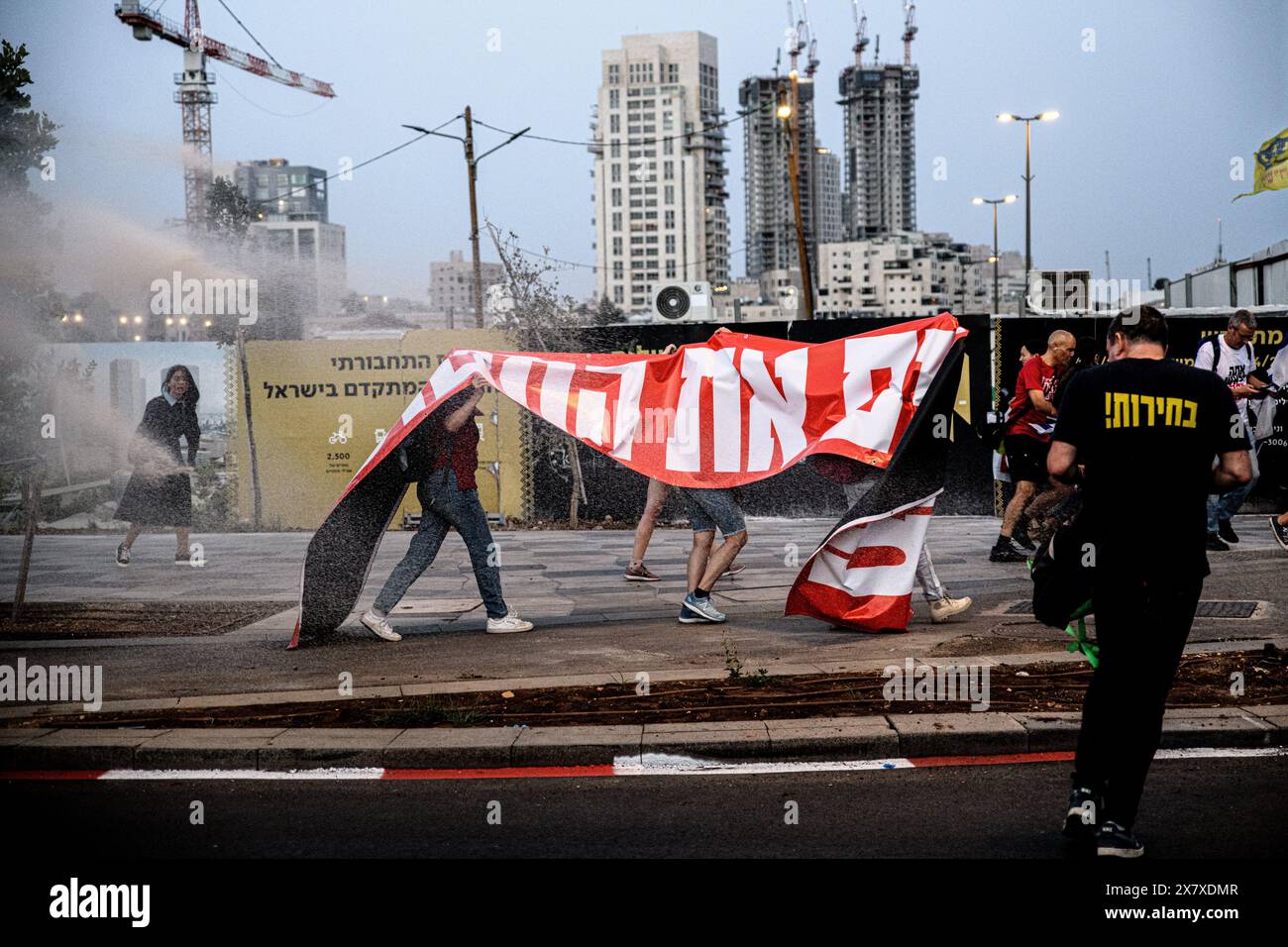 Israel. 20th May, 2024. Israeli police use a skunk water cannon to ...