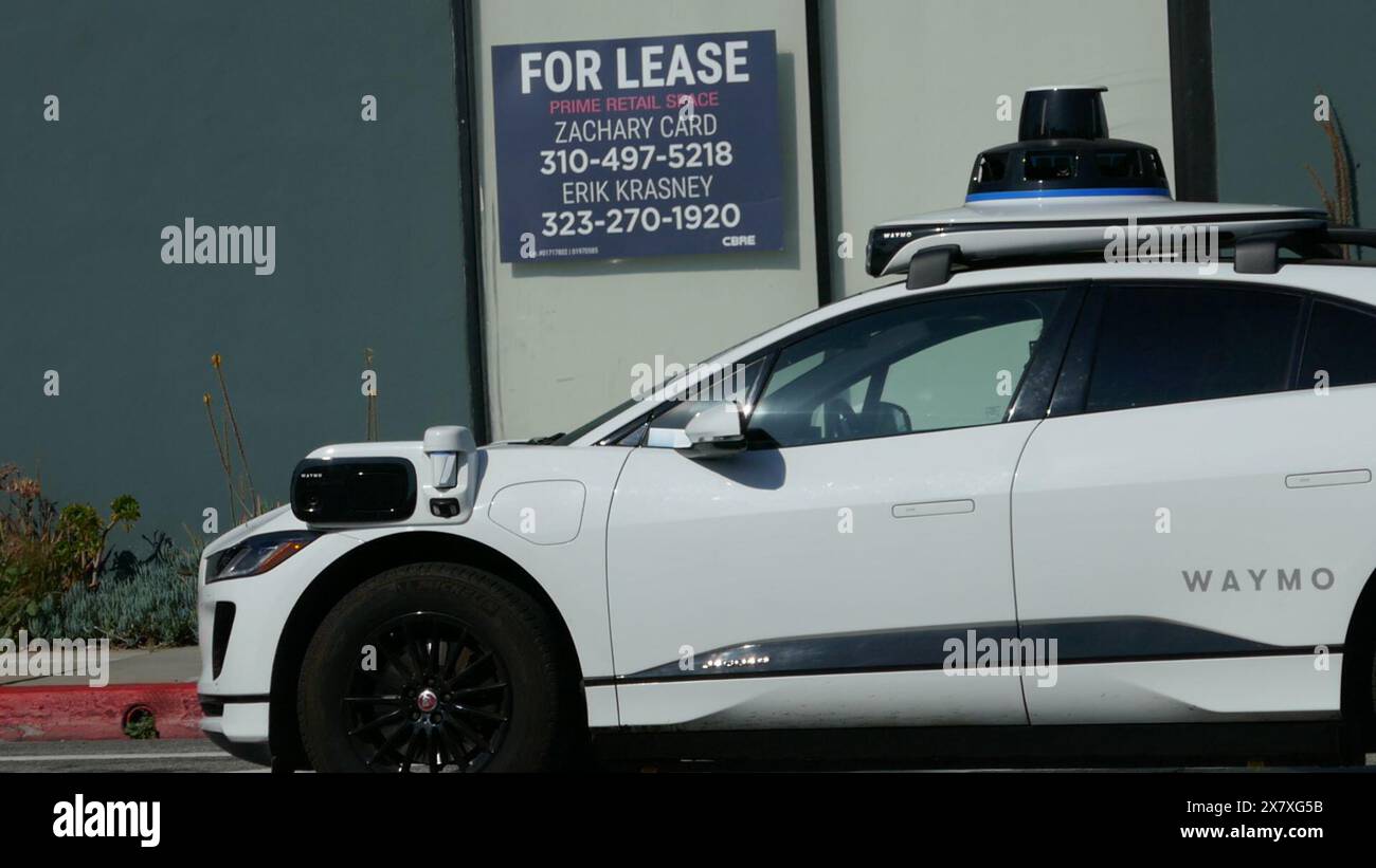 Los Angeles, California, USA 18th May 2024 Waymo Driverless Car driving ...