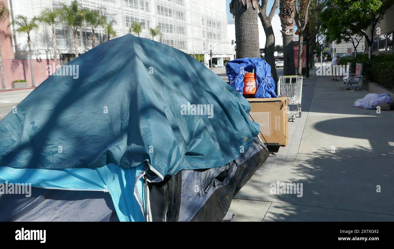 Los Angeles, California, USA 18th May 2024 Homeless man sleeping and ...