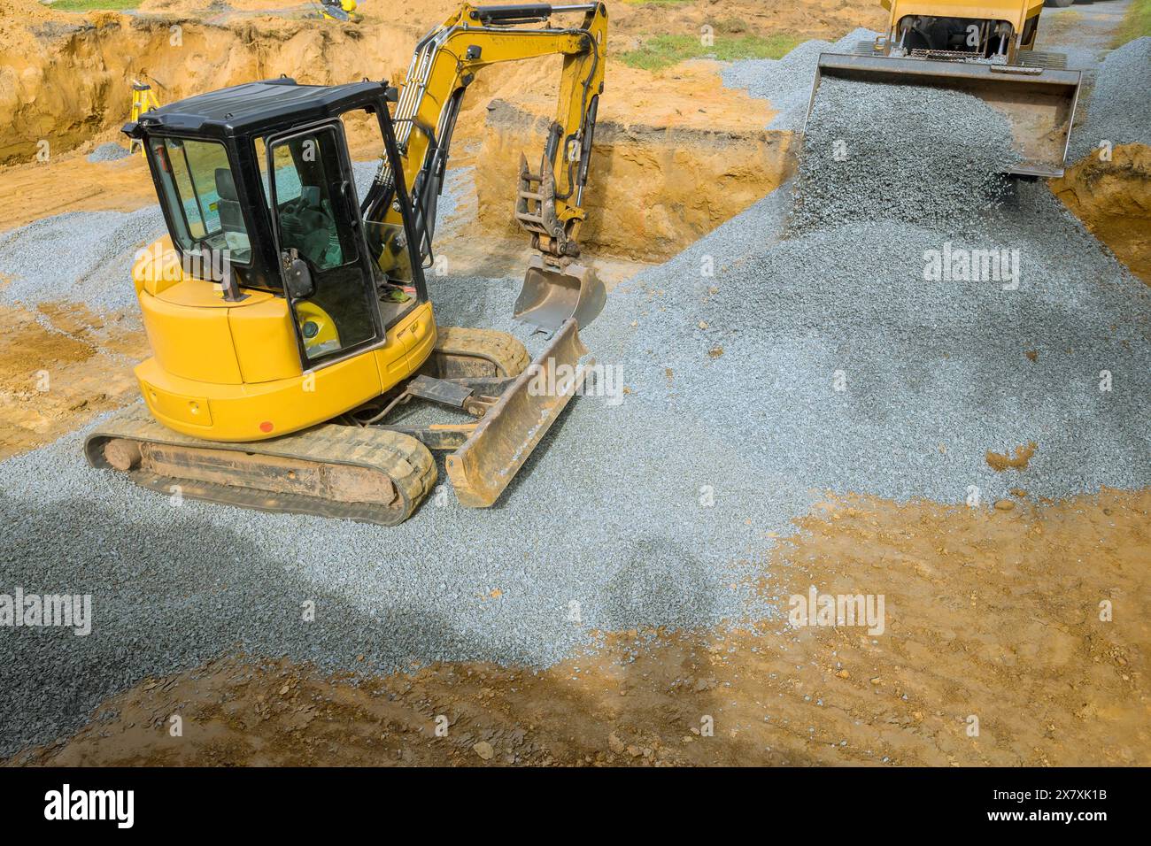 Construction sites require an excavator to fill irregularities with ...