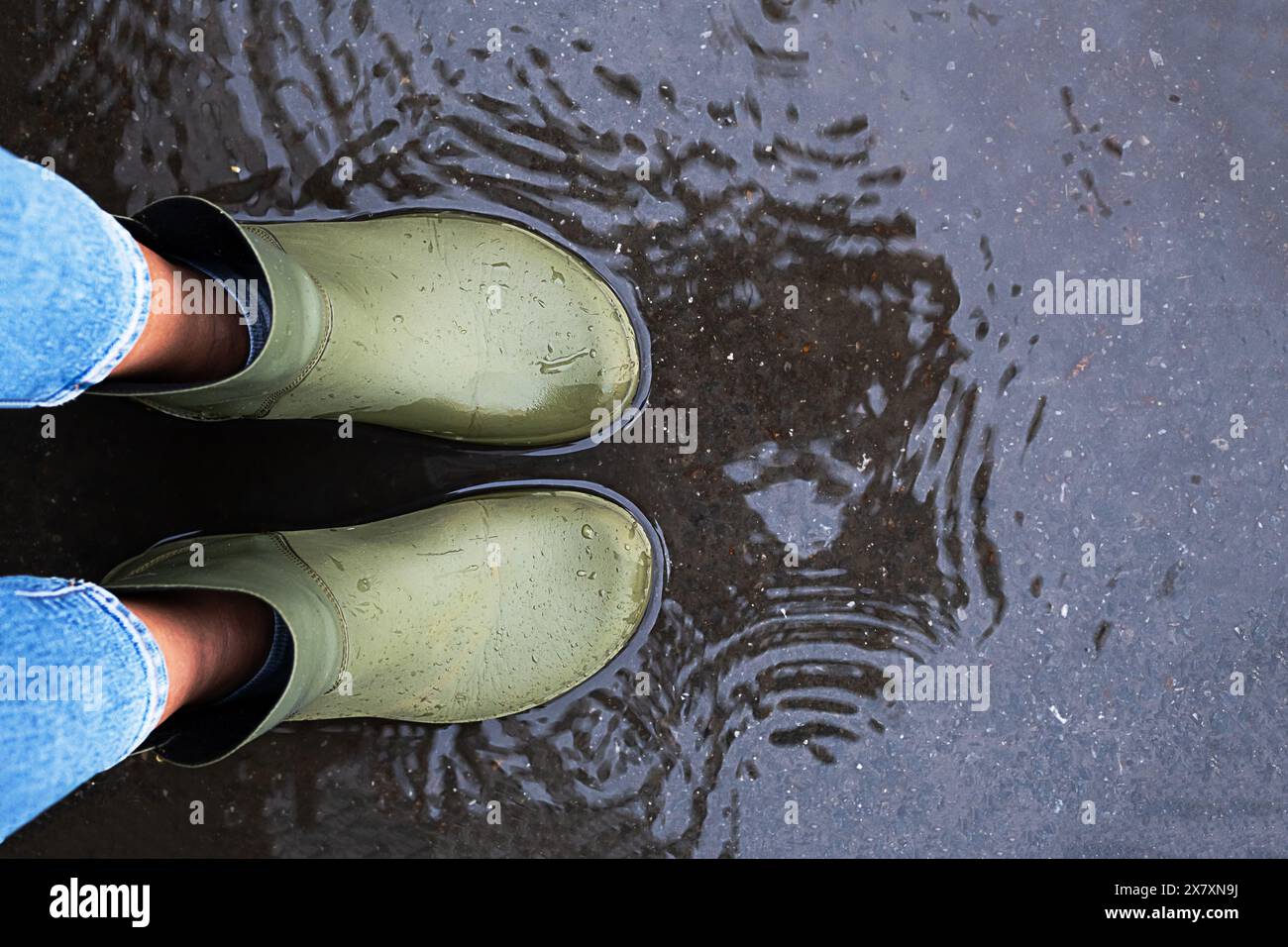 Woman wearing rubber boot hi-res stock photography and images - Alamy