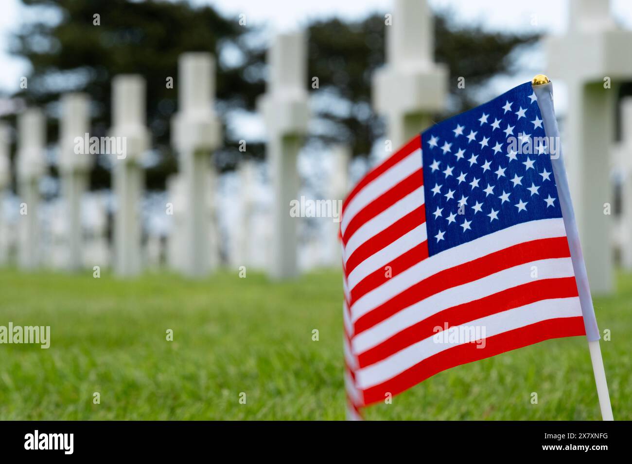 American flag in front of American Cemetery graves at Normandy area ...