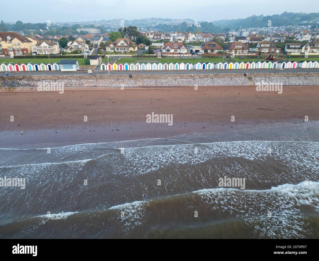 Aerial photograph of Preston Sands Beach as waves roll onto the sandy ...