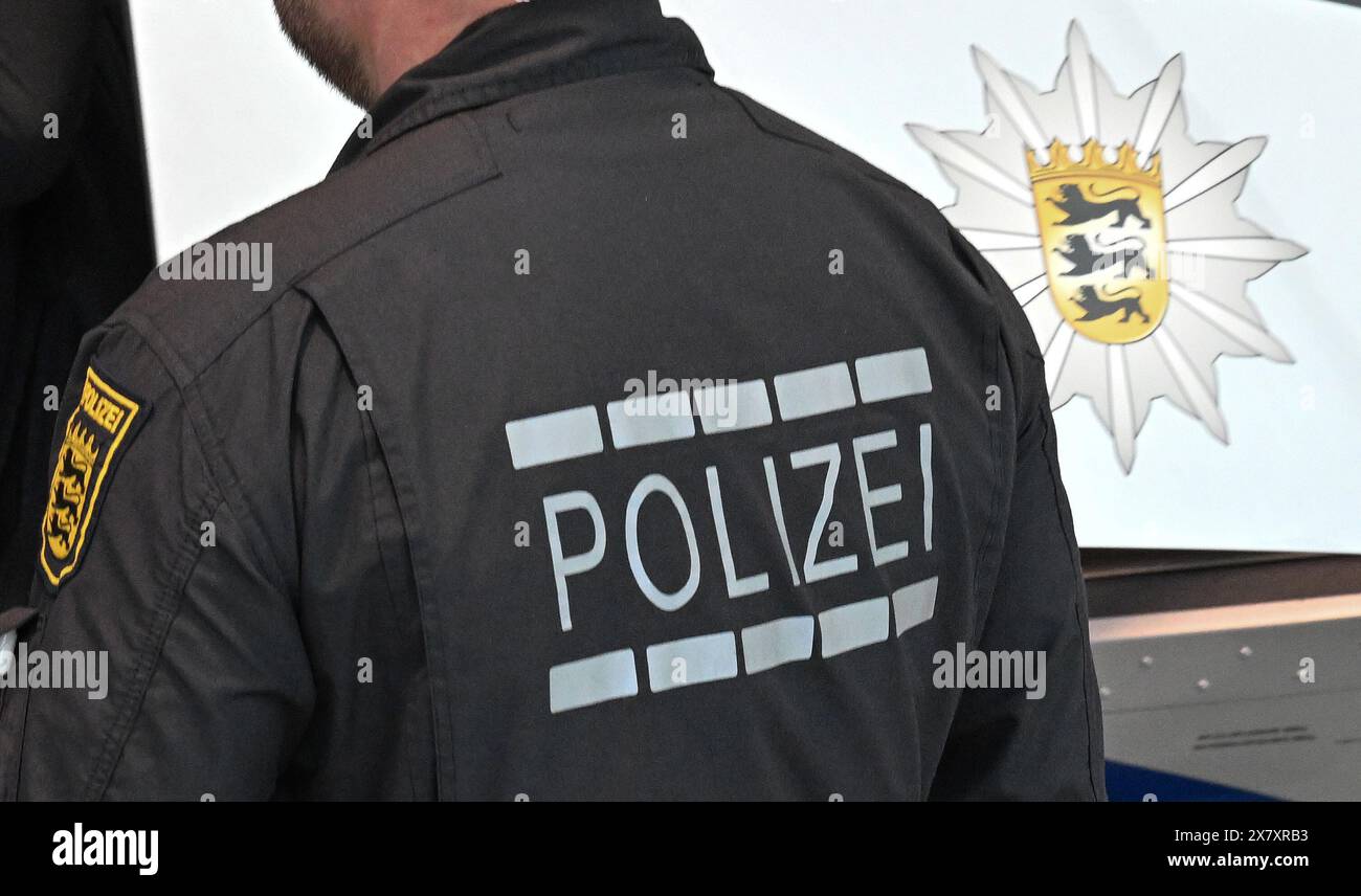 Stuttgart, Germany. 21st May, 2024. A police officer stands in front of ...