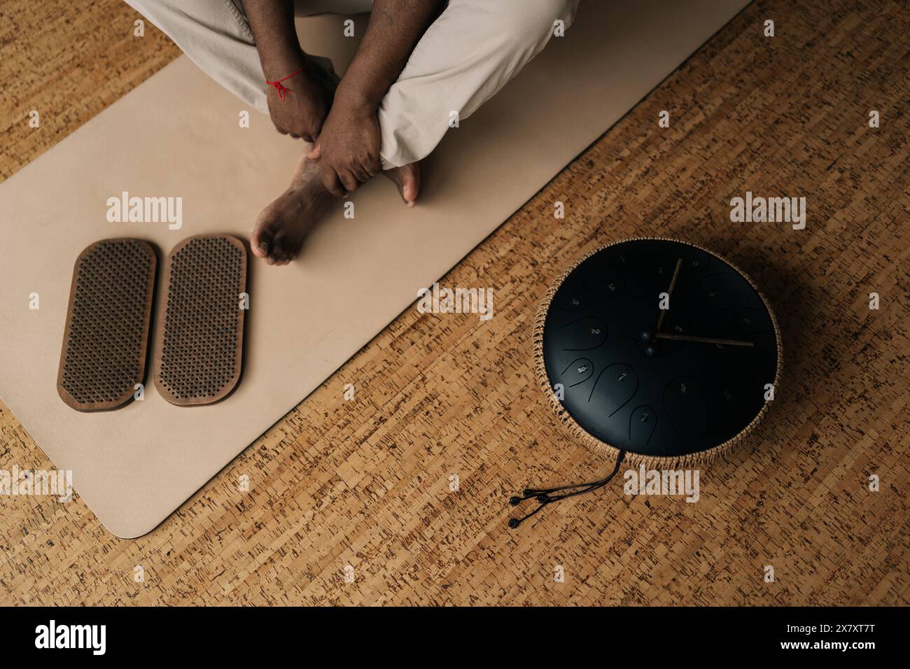 Top view cropped shot of unrecognizable African young man in trance ...