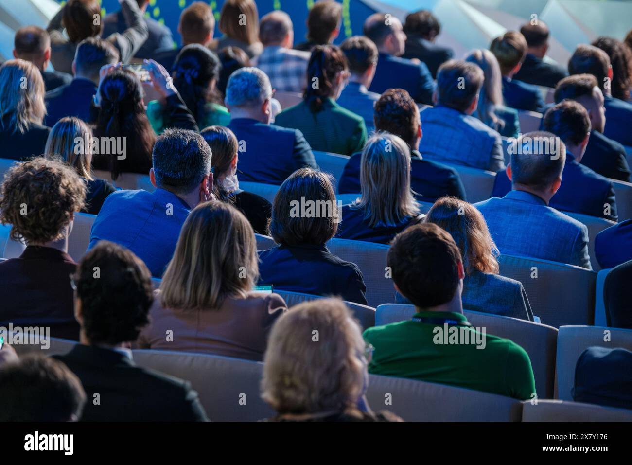 Large group of people attending a business conference. The image ...