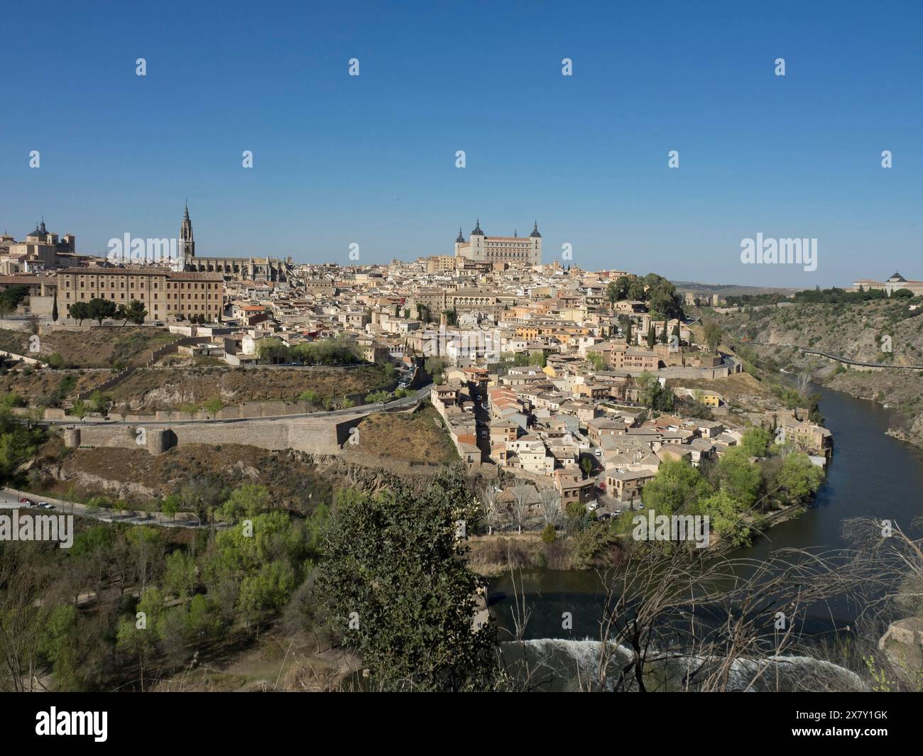 View of a historic riverside town with distinctive architecture and ...