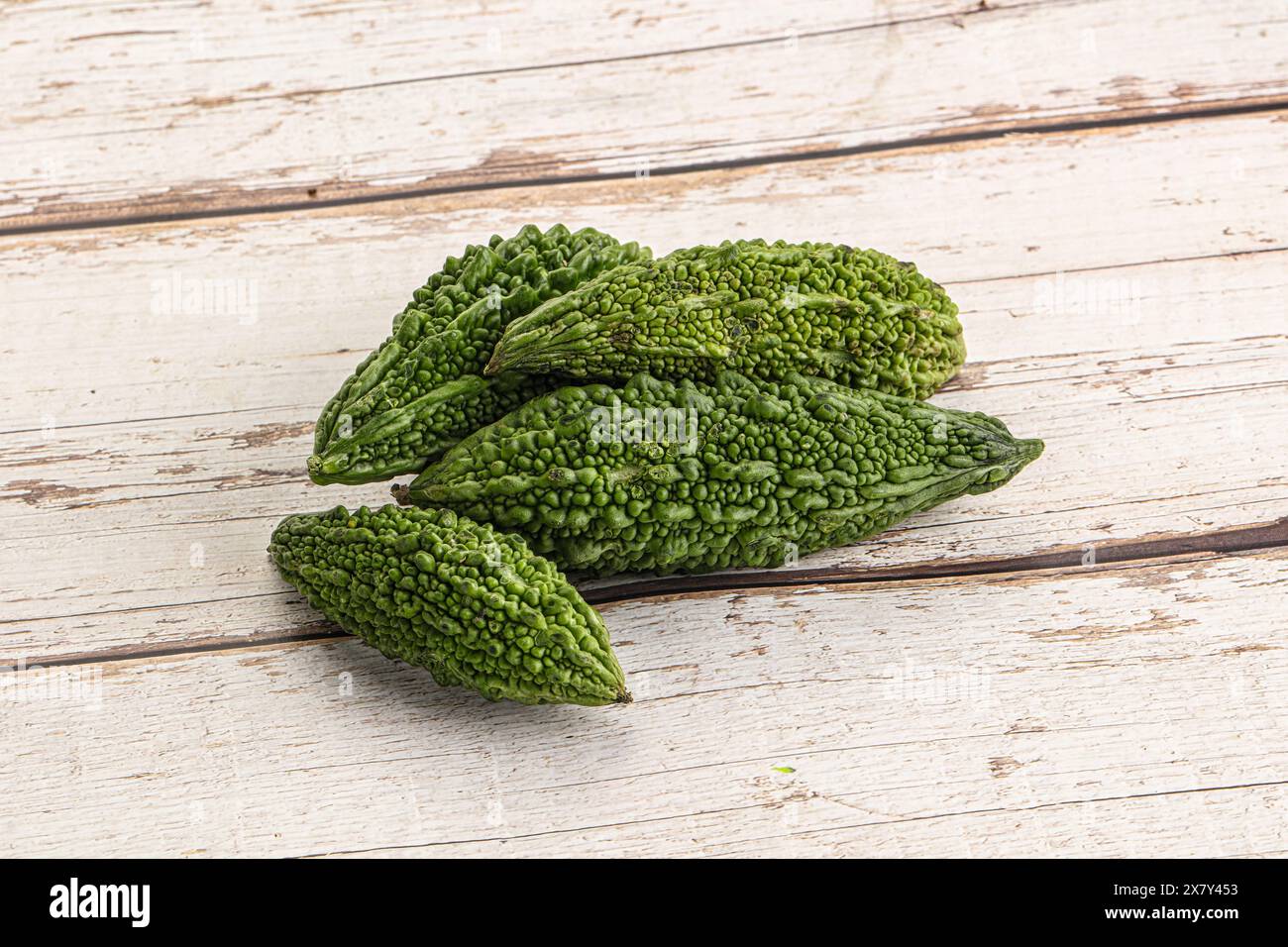Green raw bitter lemon vegetables heap Stock Photo - Alamy