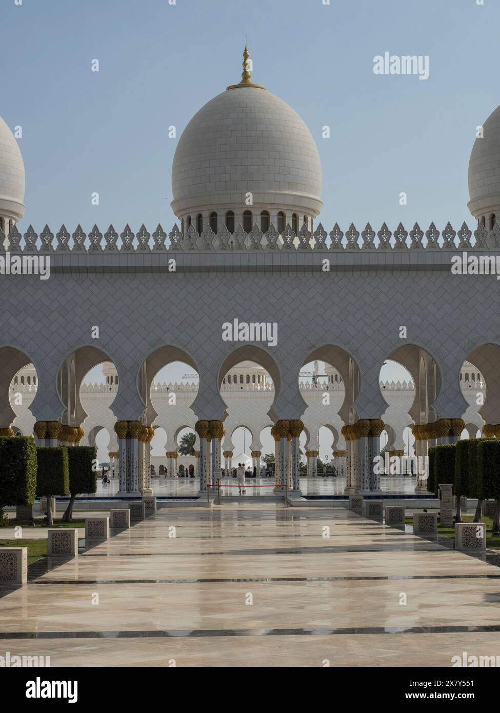 Large mosque arcades and domes, supported by impressive arches in ...